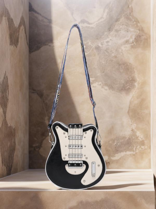 ・カラー: 黒,ワインレッド,紺,橙・素材: PU・バッグサイズ: 中型・装飾要素: ステッチ・裏地素材: ポリエステル・形状: ギター型・開閉方式: ジッパー・内部構造: ジッパー隠しポケット・硬度: 中・ショルダーストラップ: 単根・適...