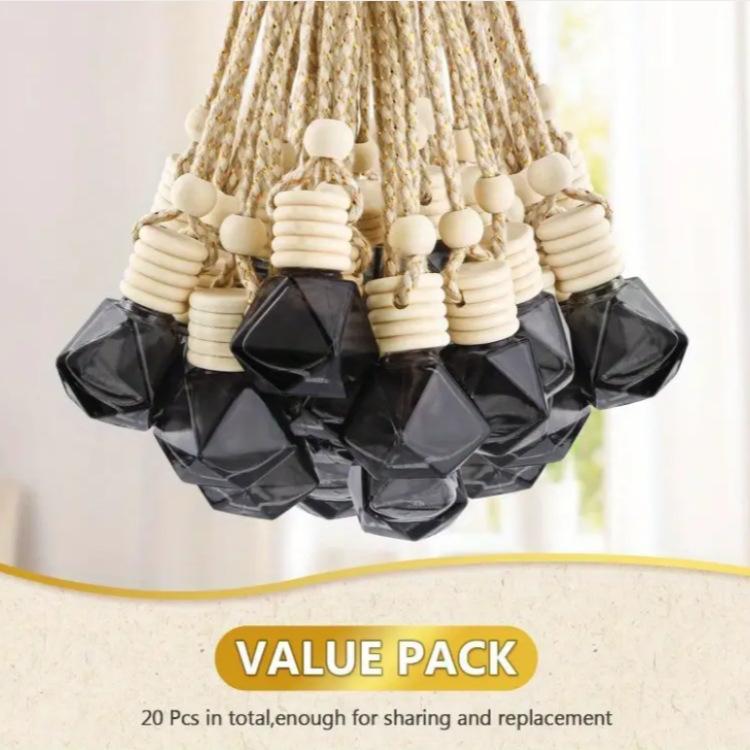 ・素材: ガラス・形状: 菱形、四方、扁円・加工: 吹き瓶・表面処理: 噴色