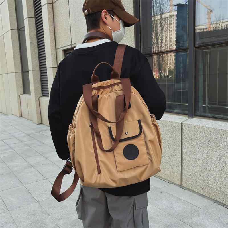 ・色: ブラック、カーキ、ホワイト・性別: ユニセックス・素材: オックスフォード布・容量: 36-55L・機能: 通気性・PC収納サイズ: 40.64cm・パターン: 無地・裏地: ポリコットン・ステッチ: ステッチライン・背負システム:...