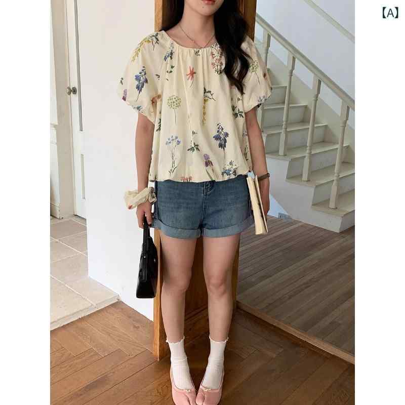 ・素材: コットン 95%以上・柄: 小花柄・タイプ: プルオーバー・袖丈: 半袖・加工: 継ぎ合わせ・シルエット: 標準・着丈: 普通（50-65cm）・首元: 丸首・袖型: パフスリーブ・色: ベージュ小花・サイズ: M,L・スタイル: 通勤