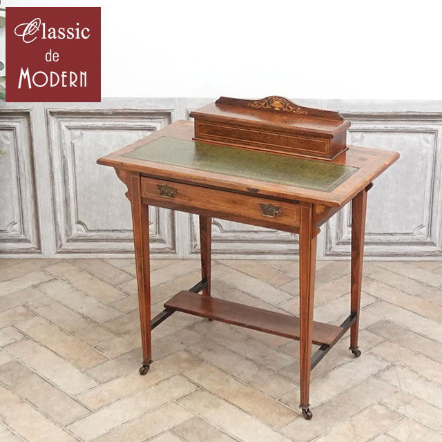 品名・品番 antique80855　デスク　1910年頃　ローズウッド材　イギリス サイズ W 77 x D 45.5 x H 85 cm 商品について エレガントな雰囲気のデスクです。 デスクとしては小ぶりなサイズになるので、レディデス...