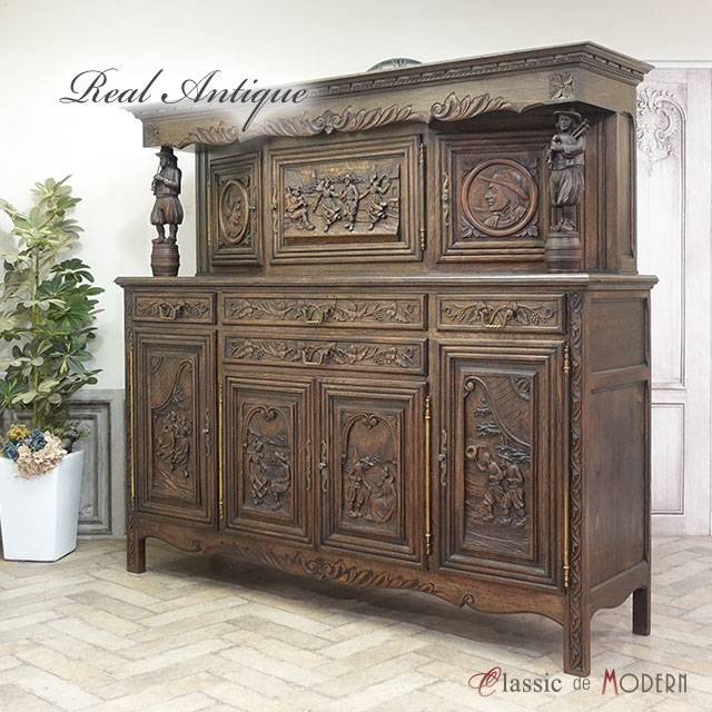 品名・品番 antique64807a　キャビネット　1920年頃　オーク材　フランス サイズ W 200.5 x D 53 x H 182 (中段天板高 115.5) cm 商品について 随所に施された彫刻が素敵なキャビネットです。 全体...