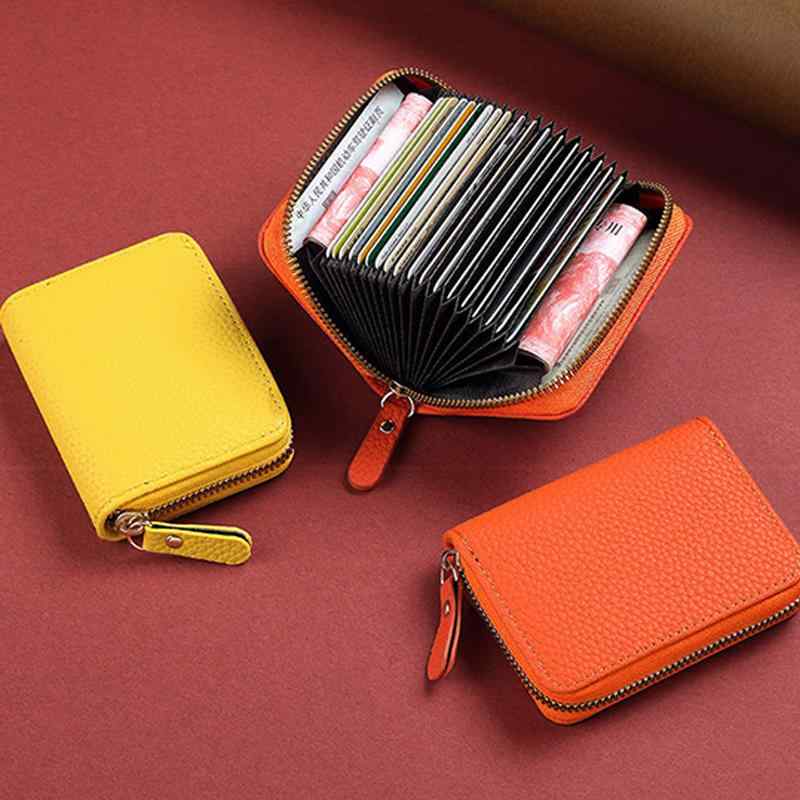 素材: PUレザーパターン: 無地カラー:オレンジ-カードスロット11枚 グリーン-カードスロット11枚 イエロー-カードスロット11枚 ブラック-カードスロット11枚 オレンジ-カードスロット18枚 グリーン-カードスロット18枚 イエロ...