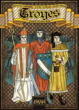 「トロワ」はフランス・シャンパーニュ地方にある都市を4世紀にわたって発展させるボードゲーム。プレイヤーはそれぞれ人口をあらわすダイスと、都市の宗教、軍事、市民という主要な3分野をあらわす手札を使用して、都市を防衛したり大聖堂の建設を行ったり...