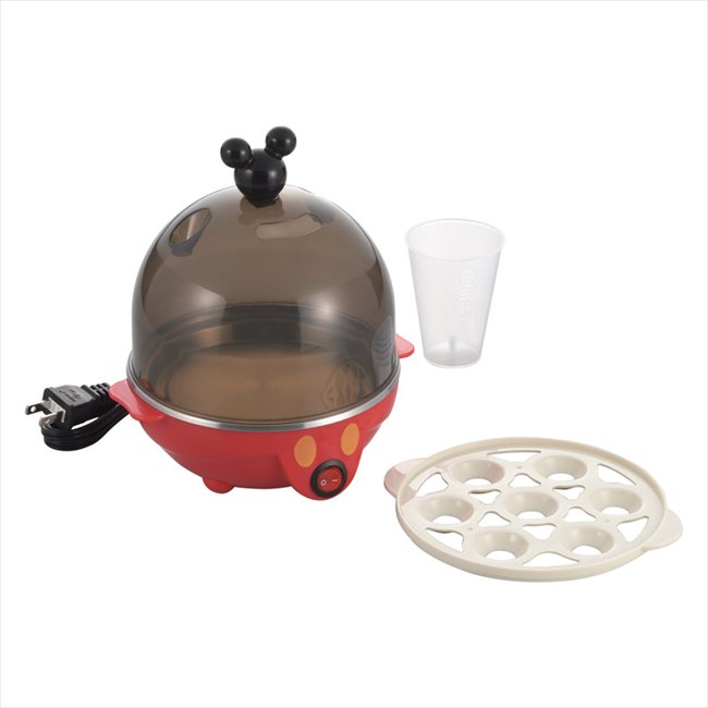 ■商品紹介：ミッキーマウスモチーフのかわいいゆで卵器です。セットしてスイッチを入れるだけで、簡単にゆで卵が作れます!半熟、完熟、お好みのゆで加減を選ぶことが出来ます♪付属の計量カップで必要な水の分量がラクラク測れます。 ミッキーマウスモチー...