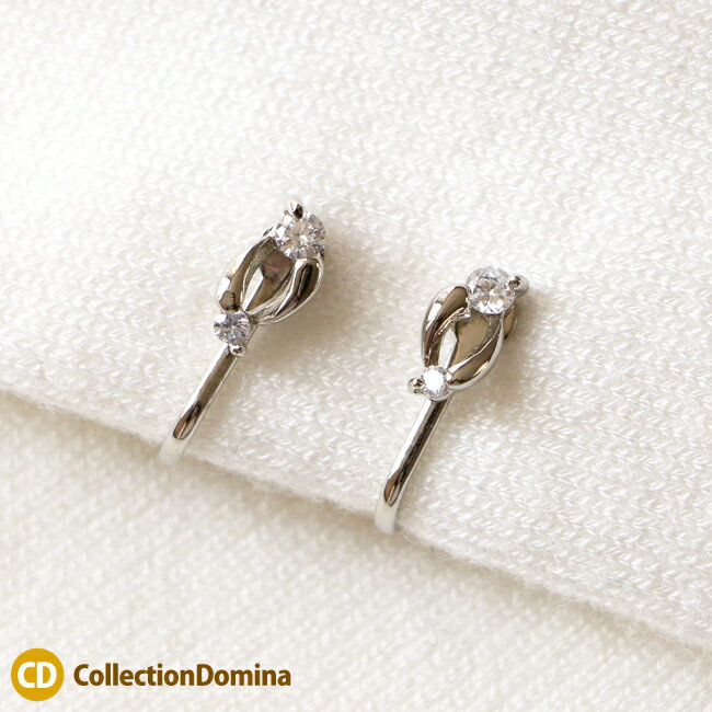 商品説明小さなキュービックジルコニアを二粒あしらったイヤリング。こちらはニッケルフリーの金具を使用しています。金具はネジバネ式ですので挟む厚さを調節できます。小ぶりで普段使いしやすい上品デザイン。素材合金、キュービックジルコニアサイズ(片方...