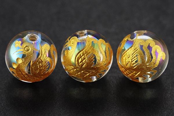 彫刻ビーズでは初の蒸着系水晶です。シャボン玉を思わせる優しげな色合いのオーロラクォーツと、金彫りの四神獣は、互いにメタリックな質感を持つため意外にもしっくり合っています。ただいま、レビューを書いていただいたお客様に200円クーポンプレゼント!!