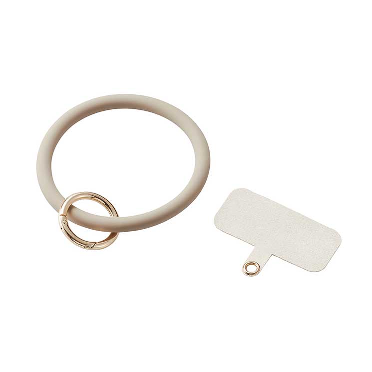 対応機種 スマートフォン 種類 ベージュ 特徴 シンプルなラウンドデザインの、手首に通して使えるリングタイプのスマホハンドストラップです。手首や腕から提げて持ち歩けるので、両手がふさがらずいつでもサッとスマートフォンの操作ができます。柔らか...