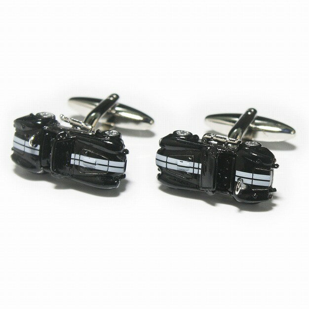 黒いACコブラをデザインしたカフスボタン 車好きな人にはたまらないデザインですよね。 中央の2本の線が魅力的ですよ♪ ベースカラーーシルバー 素材ーbrass（真鍮） サイズー12x24mm ・選べるお支払い方法　　・各種クレジットカード　...