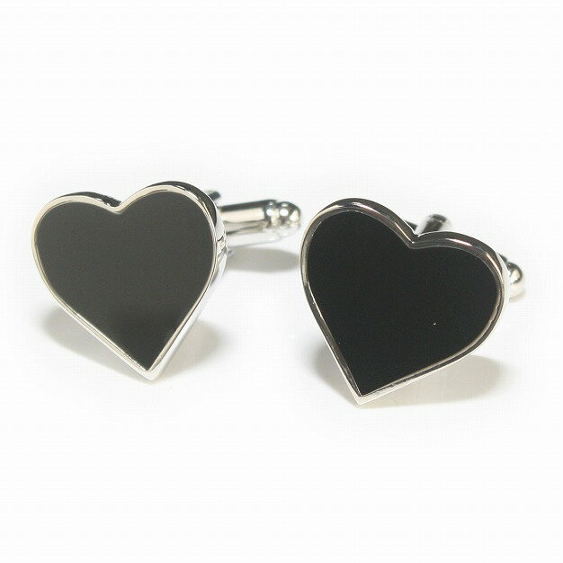 ブラックのハートシェイプのカフスボタン。 ブラックカラーなので袖口をスタイリッシュに見せますよ 袖口のアクセントにおすすめですよ♪ ベースカラーーシルバー 素材ー真鍮・ロジウムコーティング サイズー18x18mm ・選べるお支払い方法　　・...