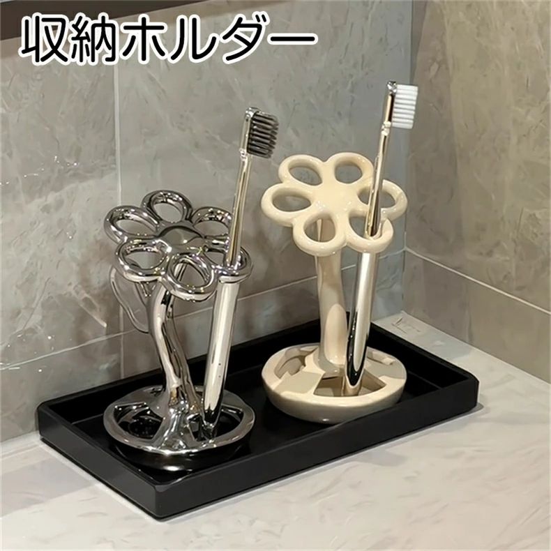 商品紹介 洗練された多機能ホルダーで、バスルームや化粧台を美しく整理！ 【多機能デザイン】 ・歯ブラシ、メイクブラシ、アイブロウペンシルなどをすっきり収納 ・バスルームや洗面台、化粧台、デスクなど幅広いシーンに対応 ・歯磨き粉ホルダーやコス...