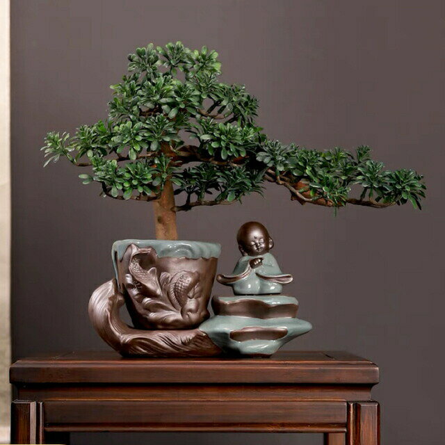 商品説明葉の材質：エコプラスチック+セラミック幹の材質：自然木（特殊加工）鉢の材質：陶器製外寸サイズ:幅34 x 奥行き15 x 高さ30（cm)※天然素材を使用し、ハンドメイドで作成した商品になりますので、そのため製作時期によって若干画像...