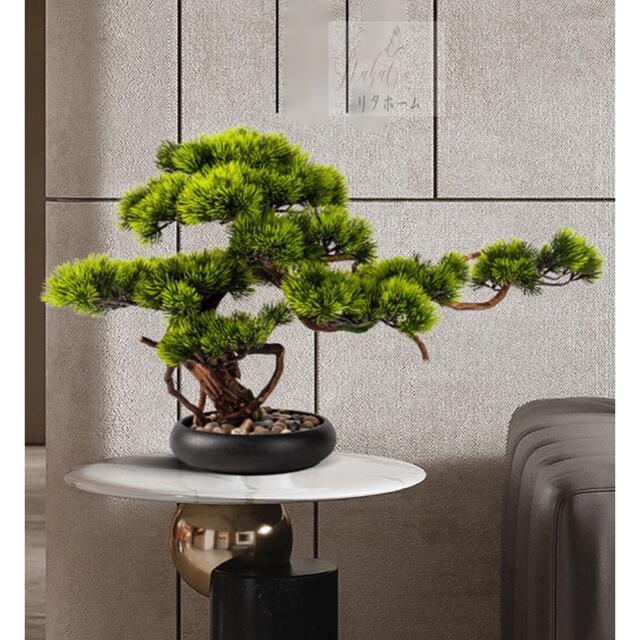 商品説明葉の材質：エコプラスチック+セラミック幹の材質：自然木（特殊加工）鉢の材質：陶器製サイズ:幅63 x 高さ43（cm)※天然素材を使用し、ハンドメイドで作成した商品になりますので、そのため製作時期によって若干画像と異なる場合がありま...