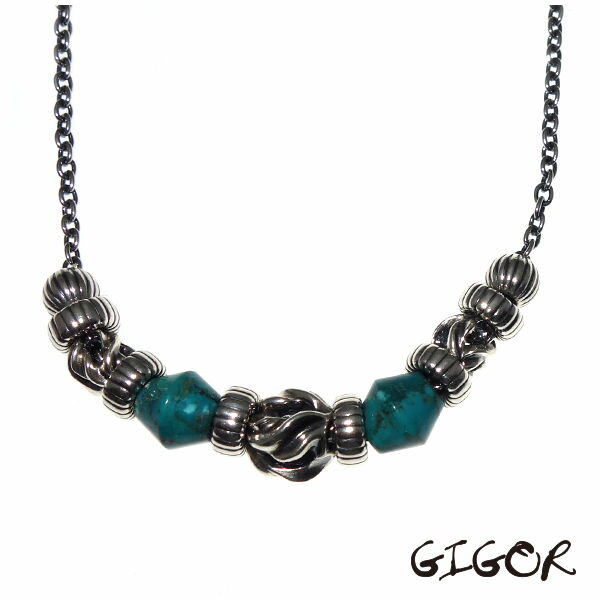 メンズシルバーアクセサリーブランド 『 GIGOR ( ジゴロウ ) 』時に鋭く、時に滑らかに、それぞれのラインが交差し絡み合った瞬間、ひとつの形がうまれる。ターコイズと透かし玉を使用し鮮やかさと光沢が融合されたペンダント。●スペック素材シ...