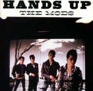 「 HANDUP」 THE MODS THE MODS は常にアグレッシヴな活動スタンスと“現役(リアリティー)”をキー プし続けているバンドである。1981年のデビュー以来、時代に流されることなく音楽に対する真摯な姿勢を貫き今日まで活動。...