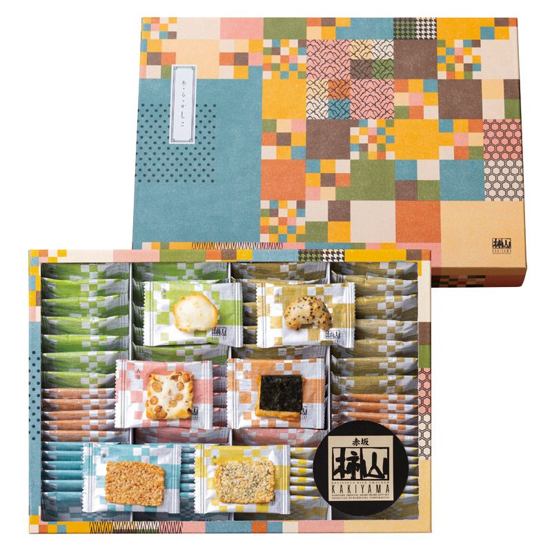 　ギフトサービスについて箱根地方の伝統工芸・寄木細工をアレンジしたモダンでカラフルなパッケージは、カジュアルながらも高級感があり、様々な手土産に最適です。中には一口サイズのおかきを6種類詰め合わせました。箱根地方の伝統工芸・寄木細工をアレン...