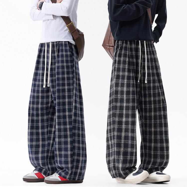 ワイドパンツ メンズ チェック柄 バギーパンツ ルーズパンツ 紐パン ロング丈 ボトムス フランネル 秋冬肉厚の起毛生地を使用。シーズンムードを高めてくれるチェック柄と相まって、この秋冬毎日着たいと思えるトレンドボトムスです。[素材]フラン...