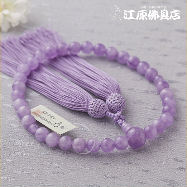 商品名 藤雲石8ミリ共仕立　正絹松風房 商品説明 女性に大変人気の高い、藤雲石の数珠です。この柔らかな女性らしいイメージに奥ゆかしさを兼ね備えた藤色が魅力のひとつです。とても上品で、女性らしい数珠として人気のある珠です。 形状・サイズ 【主...