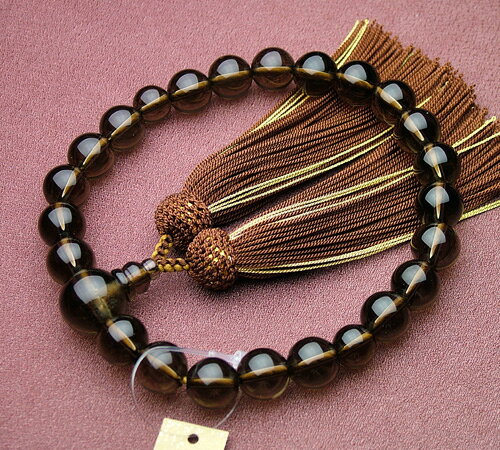 サイズ 22珠（主珠） 材質 【主珠】茶水晶（12mm） 【親珠】茶水晶（16mm） 【二天珠】茶水晶（9mm） 房 茶色×金糸（正絹頭付） 付属品 専用桐箱付 京職人の手づくりタグ付 宗派 どの宗派でもお使いいただけます。 備考 ■匠シリ...