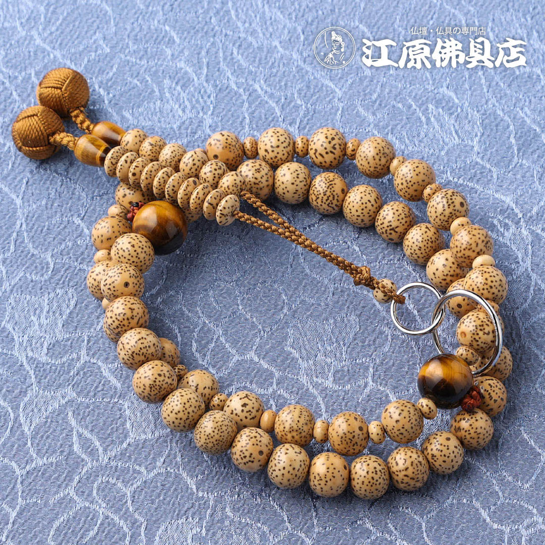 商品名 浄土宗 星月菩提樹三万浄土 虎目石仕立 正絹利久梵天房（銀輪入り）　 珠数 47珠（主珠） 材質・サイズ 【主珠】星月菩提樹（10mm） 【親珠】虎目石（16mm） 房 渋金茶（正絹利久梵天房） 付属品 専用桐箱付 宗派 浄土宗用 ...