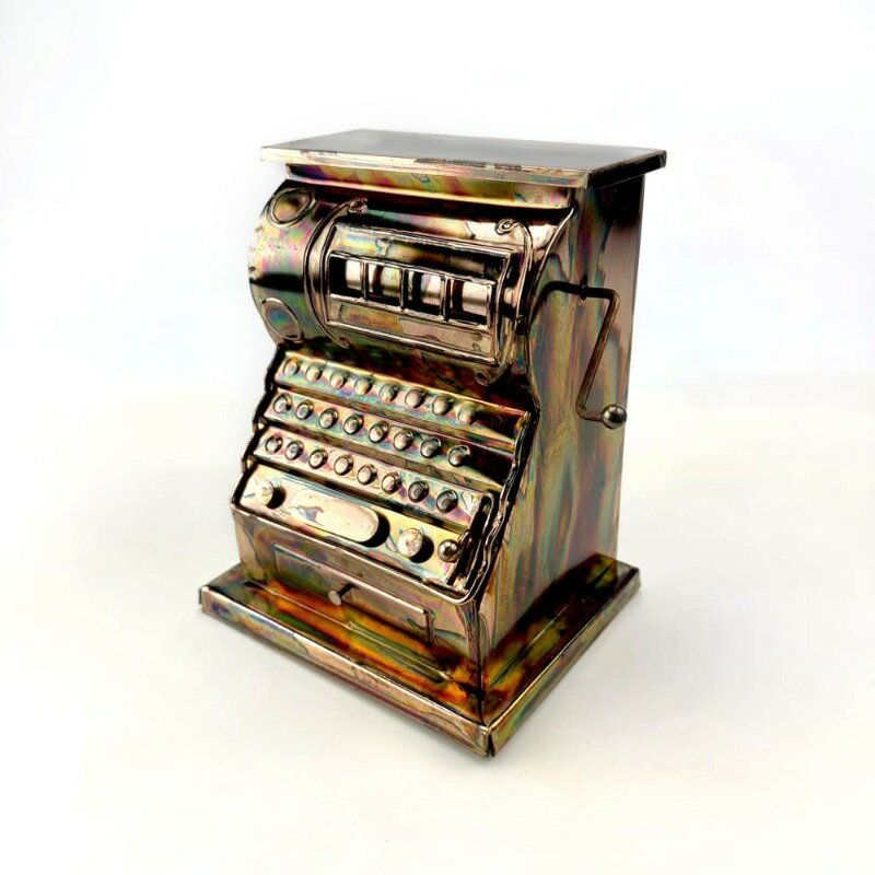 ブリキのからくりオルゴール　レジスター 昔のレジスターをモチーフにしたアンティーク調ブリキオルゴール レバーを回してゼンマイを巻くと、レジスターの数字がぐるぐると回ります。 左サイド 背面 右サイド 内側には、アメリカ「Berkeley」社...