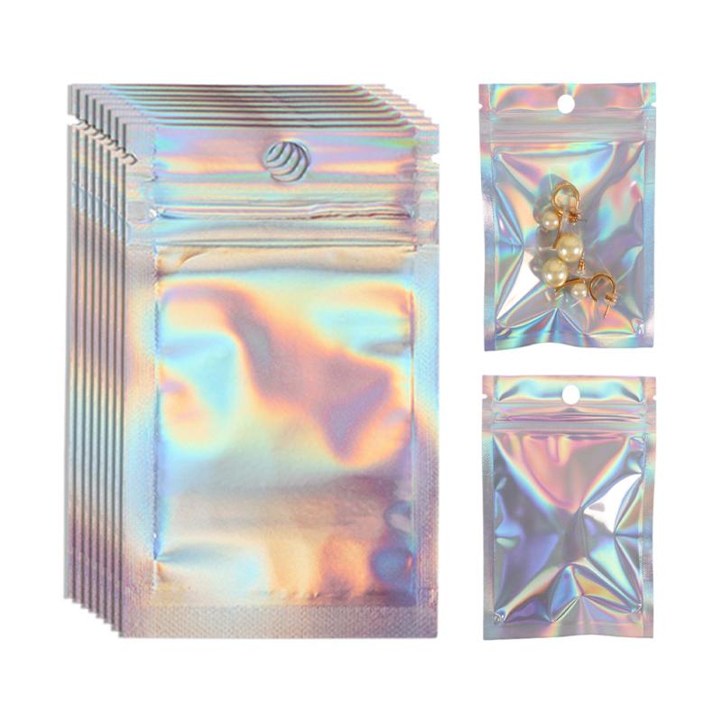 SensaBliss オーロラ チャック袋 包装袋 アルミ袋 厚手 ミニ 透明 ジッパー付き 収納袋 アクセサリー ジュエリー 食品用 小分け用 ラッピング 小物収納 再利用可能 10cm×6cm 100枚セット【商品仕様】オーロラ チャッ...