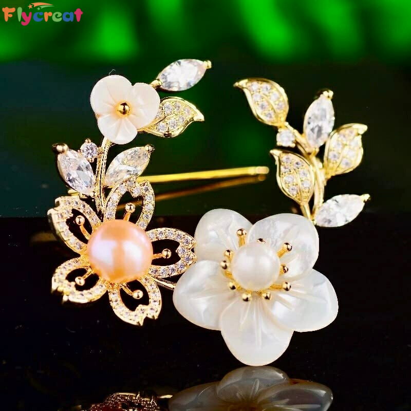 ★サイズ：約4.3cmx3.8cm ★重さ: 約 10g ★自分へのご褒美にも、恋人、ご家族、ご友人など大切な方へのプレゼントにも超オススメです ★付属品:きれいなギフトケースx 1個。 ★独特な綺麗な天然貝殼の桜花のデザインで、清新感アッ...