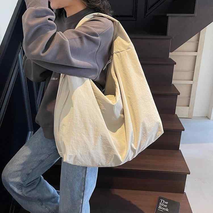・カラー展開: 米白色、黒色、深カーキ、緑色、浅青色、紺色、黄色、カーキ色、赤色、深赤色・スタイル: クロスボーダー・主な素材: ナイロン・カテゴリ: トートバッグ・サイズ: 大・形状: 水餃子型・開閉方式: ジッパー・内部構造: ジッパー...