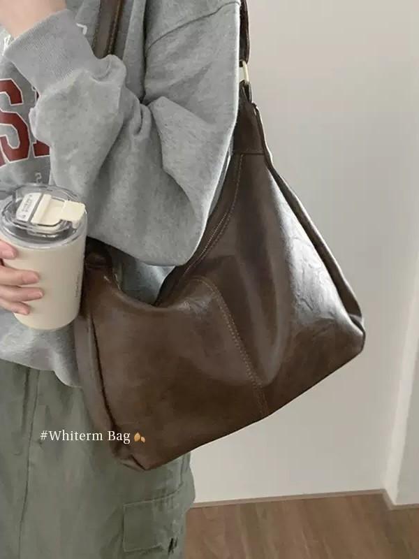 ・スタイル: 都市簡約・主な素材: PU・形状: 横型方形・種類: トートバッグ・サイズ: 中・人気要素: ステッチ・開閉方式: オープン・内装: ジップポケット、ジップ挟み込みポケット・硬さ: 中・外ポケット: サイドポケット・ショルダー...