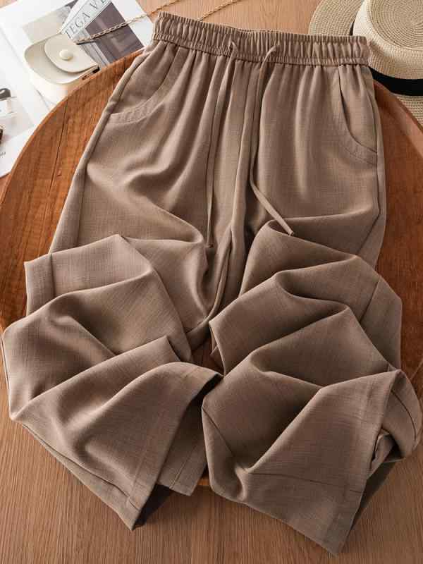 ・カテゴリ: ワイドパンツ・スタイル: 通勤・主な素材: 粘膠繊維50-70%・主な素材2: 麻類混紡30%以下・パンツタイプ: ワイドレッグ・パンツ丈: ニーパンツ・ウエスト: ハイウエスト・厚み: 薄手・流行要素: ドローストリング・カ...