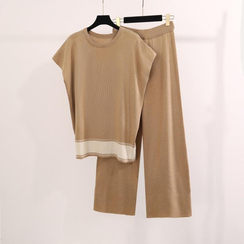 ・カテゴリ: セットアップ・スタイル: 通勤風・主な素材: 涤纶50-70%・カラー展開: ブラック、杏色、咖色、驼色・サイズ展開: S、M、L、XL・袖丈: 三分袖・袖型: 飛袖・パンツ丈: ロング・流行要素: ニット・工艺: ニット