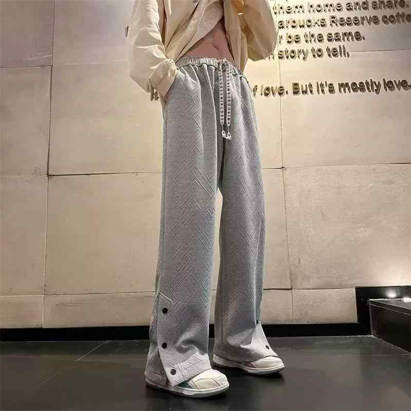 ロングパンツ メンズ 秋冬 ズボン カジュアル 切り替え ボタン付き スリット ワイドパンツ ゆったり ストレート 大きいサイズ 港風 ジャガード おしゃれ・カテゴリ: 運動カジュアルパンツ・スタイル: 日式レトロ・パンツタイプ: ルーズフ...