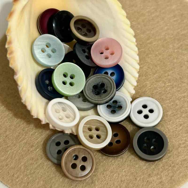 items: item: 素材value: 樹脂 item: 形状value: 丸型 item: 適用範囲value: 下着、シャツ、制服、衣料品、ベビー服 item: 型番value: 1号款式（1000颗装）,2号款式（1000颗装）,...