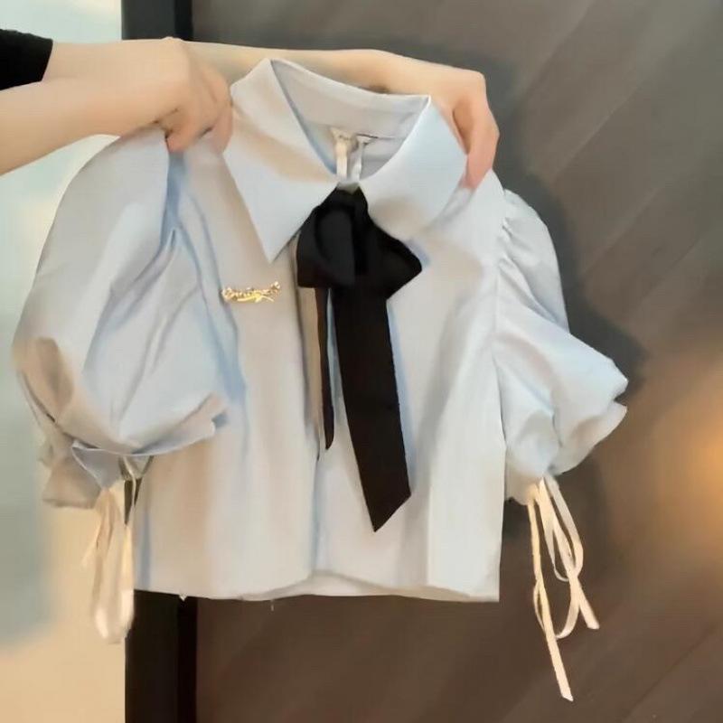 ・カテゴリ: shirts・主な素材: ポリエステル・スタイル: シンプル、通勤、アーバンスタイル・袖丈: 半袖・シルエット: ルーズ・ネックライン: POLO襟・袖の形状: パフスリーブ・カラー: ライトブルー・サイズ: S、M、L、XL