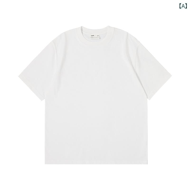 Tシャツ。通気性のある綿素材。ゆったりとしたフィット。クルーネック半袖。幾何学模様のプリント入り。