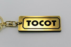 【商品詳細】 ・サイズ： 縦：2cm×横5cm×厚み0.3cm ・色： 金/黒 ・素材： 2層アクリル ・注意事項：モニターの発色具合により実際の色と異なる場合がございます。