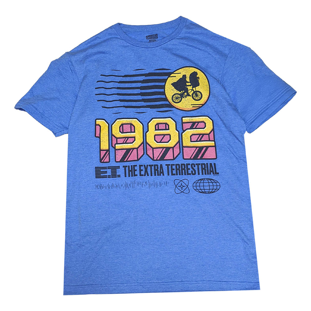 スティーヴン・スピルバーグ監督の80年代の代表作『 E.T. 』（イーティー、原題: E.T. The Extra-Terrestrial ）のオフィシャルTシャツ。80sっぽさ溢れるレトロでポップなカラーとデザインです。 コンディション：...