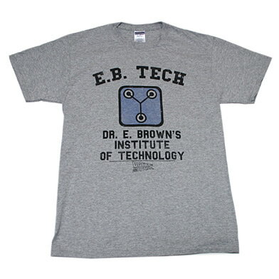 映画バック・トゥ・ザ・フューチャーのオフィシャルTシャツ。ドクが発明したタイムとラベルを実現する装置『フラックス・キャパシター』が描かれたTシャツ。レトロなカラーリングやプリントの微妙なかすれ具合が秀逸です。 バック・トゥ・ザ・フューチャー...