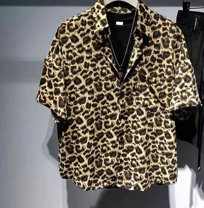 パターン: ヒョウ柄適用季節：夏袖丈:半袖シルエット: ゆったり服の詳細: ボタン装飾