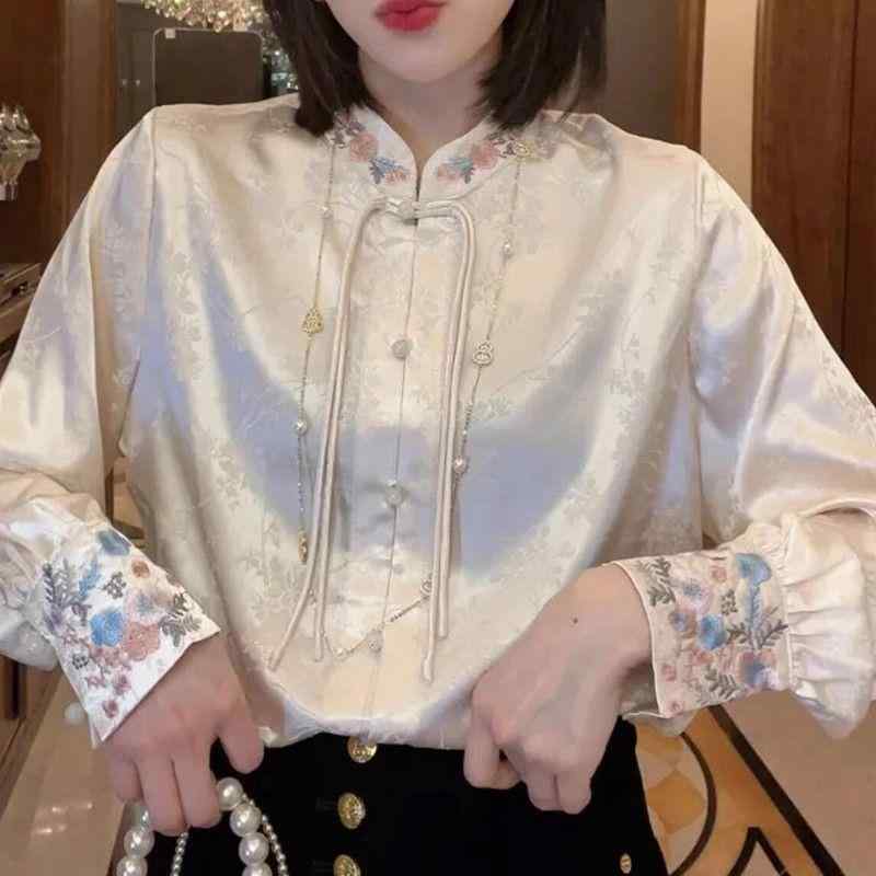 服の詳細: 刺繍生地：ポリエステル（ポリエステル繊維）スリーブタイプ: ランタンスリーブ素材構成: ポリエステル繊維シーズン: 春パターン: プリント前立て: シングルブレストと複数のボタン