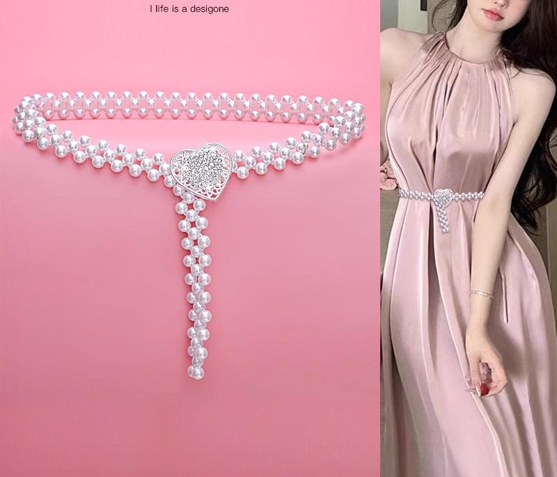 デザイン: ラインストーン.パールビーズ.ゴム仕様 スタイル: エレガント タイプ: ウエストチェーン モチーフ: ハート チェーン形状: シングルループ バックル素材: 合金 カラー: ホワイト 対象性別: 女性