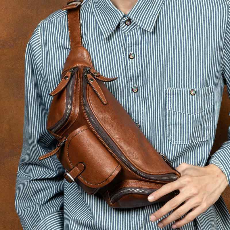 ・主な素材: 牛革・開閉タイプ: ファスナー・柄: 無地・スタイル: ストリートカジュアル・形状: 餃子型・流行要素: バイカー・カラー展開: ブラック、ブラウン・内装: ファスナーポケット・シーン: カジュアル・裏地素材: ポリエステル綿...