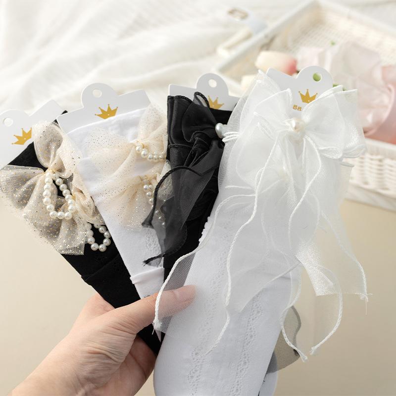 ・カテゴリ: 子供用靴下・対象: 女の子・主な素材: ナイロン 65%・機能: 通気性、吸汗・丈: クルー丈・厚さ: 薄手・柄: 無地・加工: プリント・: レース、フリル、リボン、プリンセススタイル・カラー展開: ホワイト（ゴールドパール...