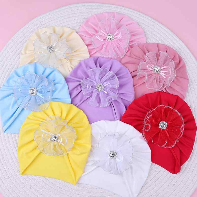 ・カテゴリ: ベビーキャップ・カラー展開: ピンク、ピンクベージュ、ホワイト、オフホワイト、パープル、レッド、ブルー、イエロー・トップの形状: ドーム型・機能: 通気性、防風・素材: ポリエステル・素材含有量: 81%〜95%・対象年齢: ...