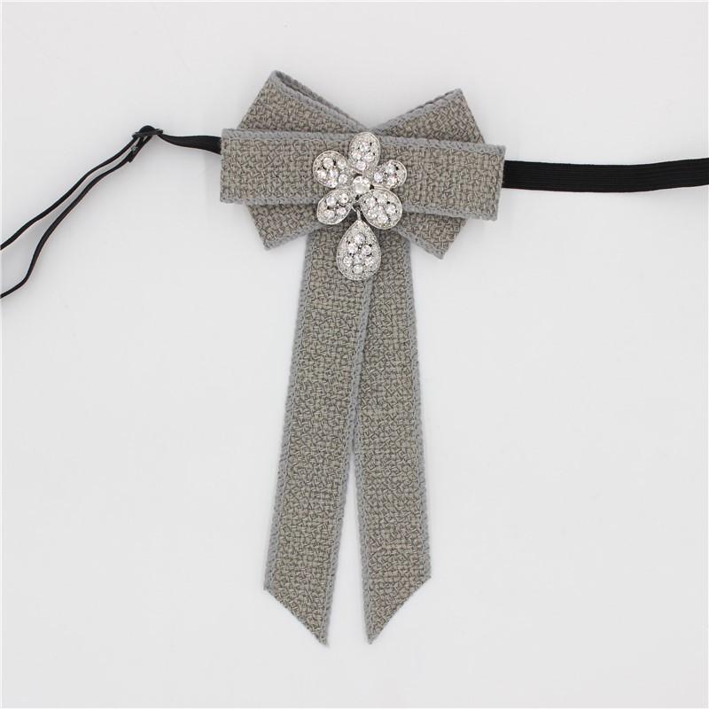 ・カテゴリ: リボンタイ、蝶ネクタイ・対象: レディース・素材: 綿麻・柄: 無地・カラー展開: ブラック、グレー、カーキ、ダークブラウン・スタイル: 矢印型、韓国スタイル・対象年齢: 大人用・幅: 2.0cm・加工: ハンドメイド