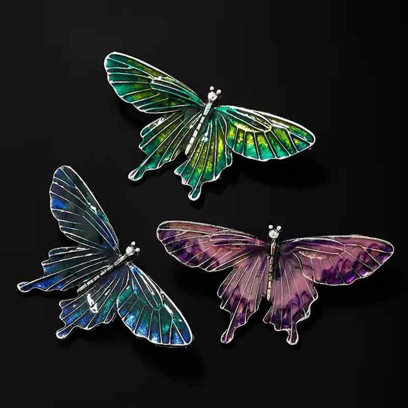 ・カテゴリ: ブローチ・素材: 合金・スタイル: レディース・対象: 女性・モチーフ: 蝶、昆虫・加工: エナメル加工・テイスト: 欧米風・カラー展開: ブルー、パープル