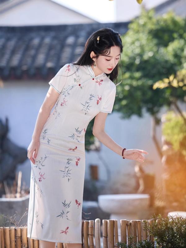 ・素材: 七彩仿麻（リネン風素材）・主素材: ポリウレタン・着丈: ロング丈・襟の形: スタンドカラー・袖丈: 三分袖・スリット: 中スリット・: プリント・カラー: 錦鯉柄・サイズ: S, M, L, XL, XXL, XXXL・スタイル...