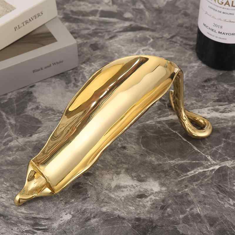 ・カテゴリ: 銅製置物・主な素材: 真鍮・タイプ: リーフ型ワインホルダー・製法: セミハンドメイド・スタイル: 中華風・設置場所: インテリア