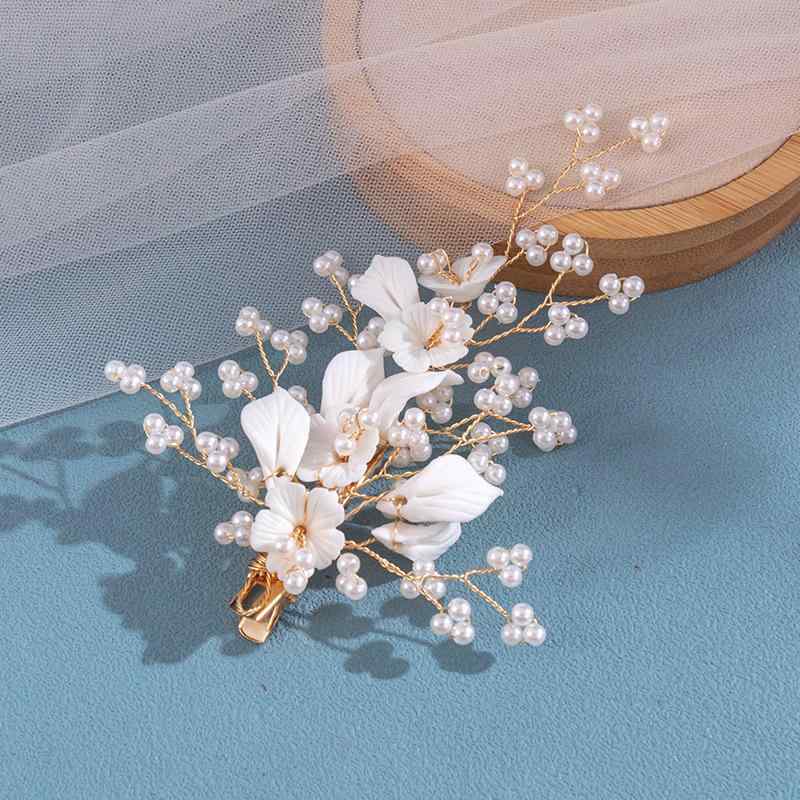 ・カテゴリ: ヘアアクセサリー・素材: パール・タイプ: サイドクリップ・カラー展開: ホワイト・: 花、植物・スタイル: 韓国、フェミニン、スイート・対象: レディース・加工: ハンドメイド