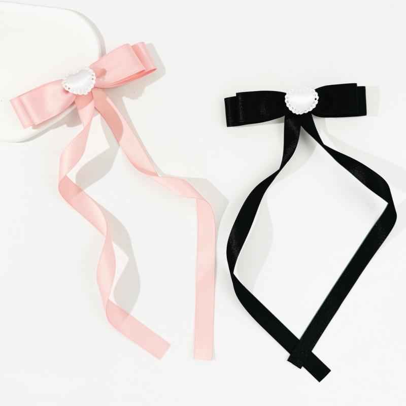 ・カテゴリ: ヘアアクセサリー・スタイル: リボンストリーマーヘアクリップ・素材: リボン・加工: ハンドメイド・ヘアクリップの種類: バレッタ・: リボン、ハート・カラー展開: ブラック、ピンク・テイスト: 韓国、スウィート・対象: レディース